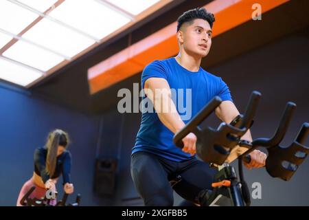 People cycling at gym. High quality photo Stock Photo - Alamy