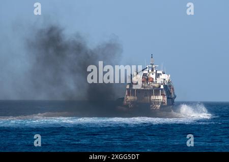 Fast hydrofoil from behind after take-off on the island of Vulcano ...