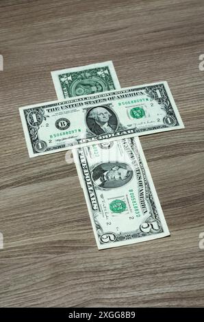 Money and religion. Banknotes of US dollars with Holy Quran book ...