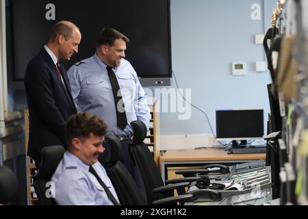 The Prince of Wales, Royal Honorary Air Commodore, RAF Valley, talks to ...