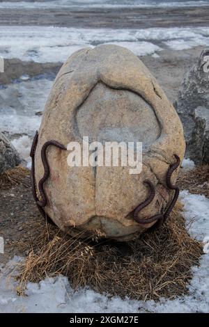 Stone carving of worms or snakes at Inuit sculpture park by the Four ...
