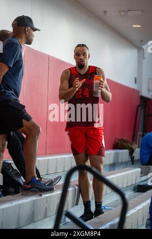 Houston Rockets forward Dillon Brooks, center, is fouled by Golden State Warriors guard Stephen ...