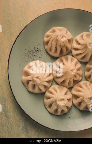 Traditional Georgian dish, Khinkali, Kalakuri, top view, rustic style ...