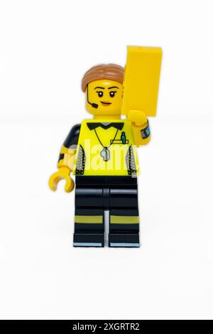 A close up image of a Lego female soccer or football referee figure ...