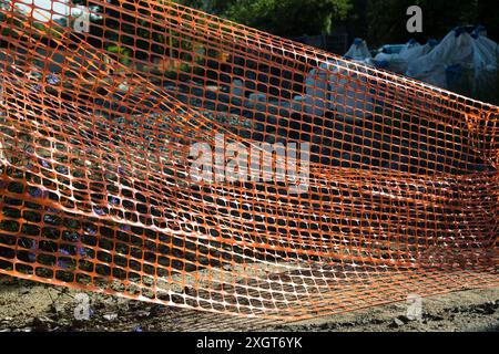 Soft fence made of plastic mesh for fencing objects and construction ...