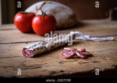A rustic culinary scene featuring sliced champignon mushrooms on a ...
