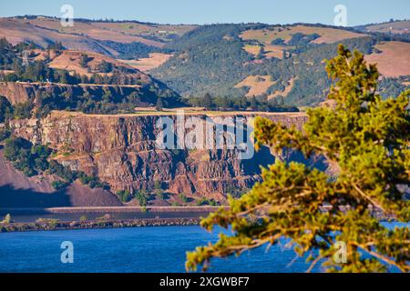 View from the cliff on a calm sea with rocks Stock Photo - Alamy