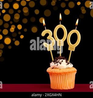 Birthday card number 300 - Cupcake with balloons Stock Photo - Alamy