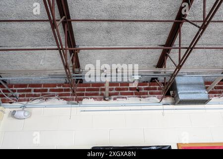 Old ceiling mounted glass drain, vent, pipes in school science room or ...