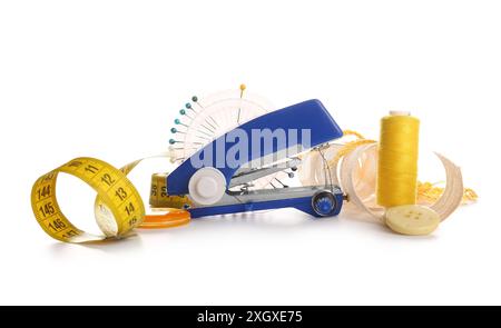 Manual sewing machine with set of tailor's supplies isolated on white ...