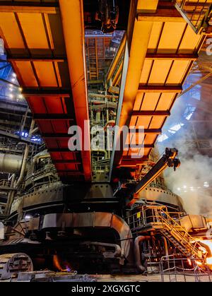 Metal cast process in blast furnace in metallurgical plant or factory ...