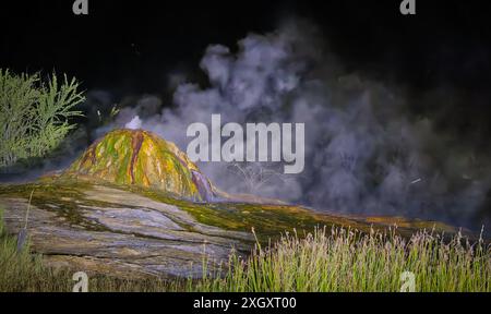 Burketown bore thermal spring mound with water bubbling onto colorful ...