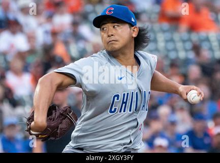 Chicago Cubs pitcher Shota Imanaga signs an autograph for Miki Taguchi ...