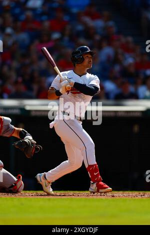 Cleveland Guardians' Steven Kwan hits an RBI infield single during the ...