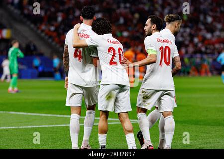 Samet Akaydin seen celebrating with team after scoring goal during UEFA ...