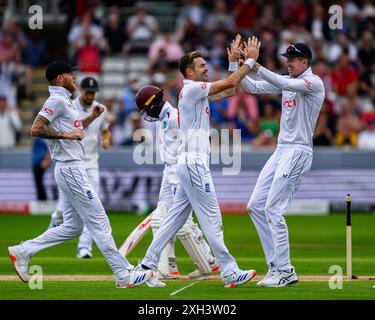 James Anderson of England celebrates the wicket of Shubman Gill of ...