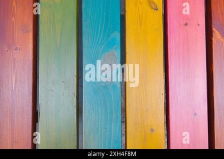 Rainbow wooden table outdoors with ashtray, hardwood and wood stain ...