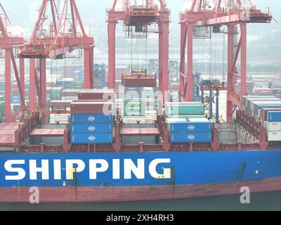 Cargo ships dock at Lianyungang Port Container Terminal in east China's ...