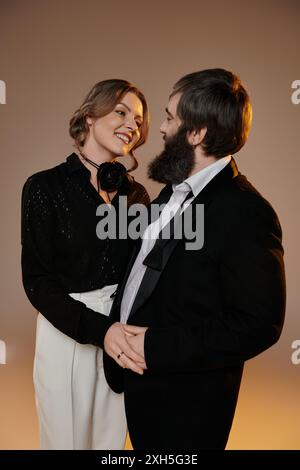 Loving couple gazing into each other's eyes in a tender moment, with ...
