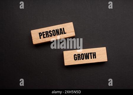 Personal growth message written on ripped cardboard paper with orange ...