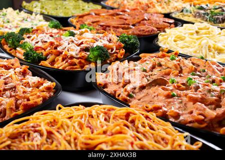 A view of several varieties of pasta trays, featuring a tray of ...