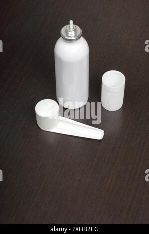 Inhaler for the treatment of respiratory organs. Spray can and cap ...