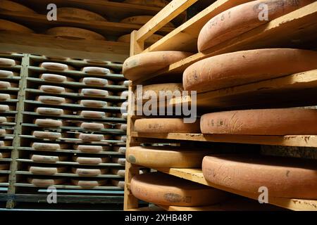 Aging rooms with many shelves in cheese caves, central location for ...
