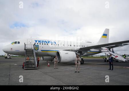 The plane carrying Ukrainian President Volodymyr Zelensky arrives at ...