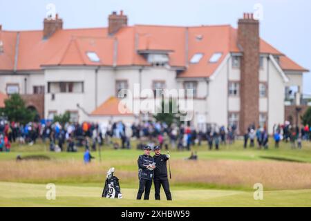 Connor Syme and his caddie Ryan McGuigan on the 1st hole during day ...