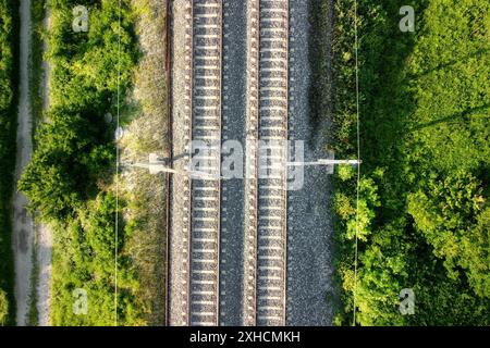 Flying over railway tracks, top view. Railway track tracks line ...