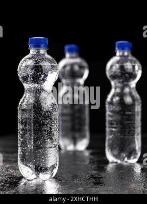 Bottles of chilled sparkling water as detailed close up shot Stock ...