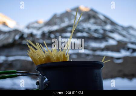 cooking pasta in the alps Stock Photo - Alamy