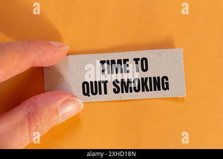 Time to quit smoking message written on wooden blocks with pink ...