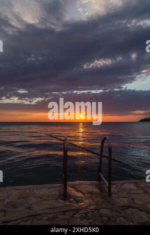 Sunset in Croatia in love on the sea shore Trpanj Croatia Stock Photo ...