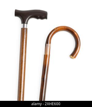 Different wooden walking canes on grey background Stock Photo - Alamy