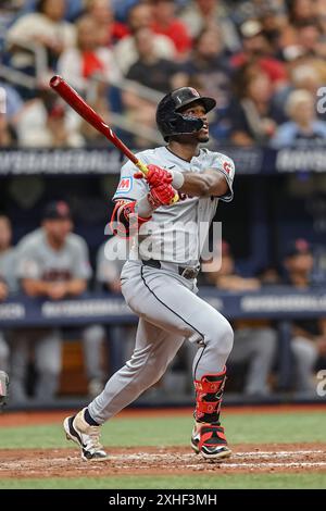 Cleveland Guardians' Angel Martinez, right, slides safely into second ...