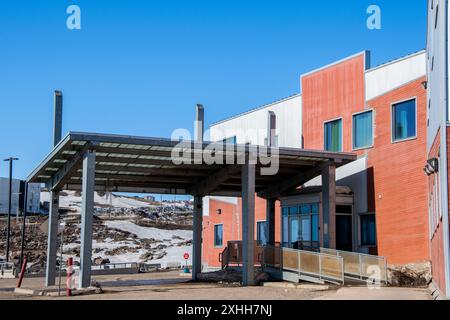 Multilingual main entrance sign at Qikiqtani General Hospital on ...