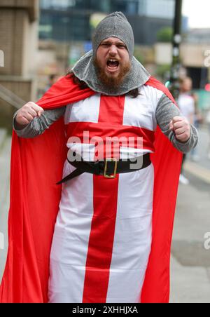 England fans at Victoria train station, Manchester. Picture date ...