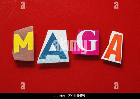 The Slogan "MAGA" using cut-out paper letters in the ransom note effect ...