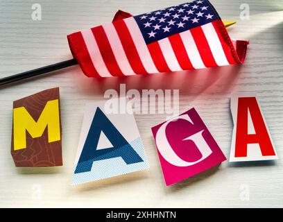 The Slogan "MAGA" using cut-out paper letters in the ransom note effect ...