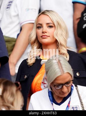 Megan Davison, partner over England's Jordan Pickford can be seen ...