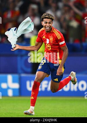 Spain’s Lamine Yamal celebrates their victory after the UEFA Euro 2024 ...