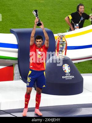 Spain's Rodri with the Player of the Tournament trophy after winning ...