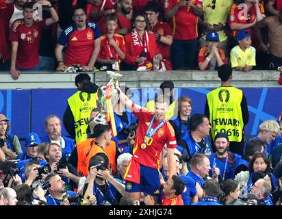 Spain's Dani Olmo celebrates with the Henri Delaunay Cup following the ...