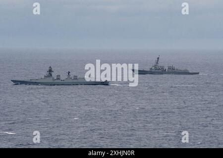 INDIAN OCEAN (July 12, 2024) From left to right: The Arleigh Burke ...
