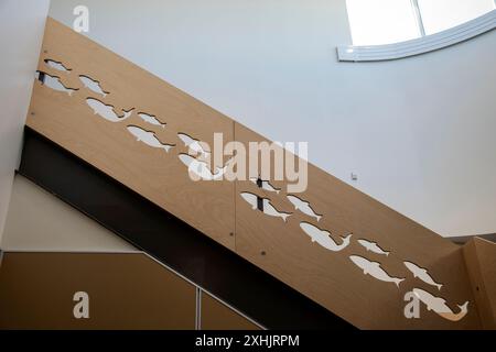 Cutouts of arctic char fish design on the railings of the stairs in ...