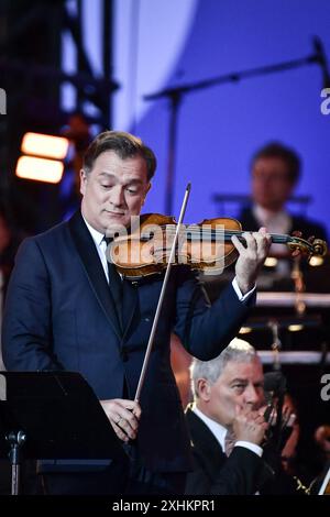 French violinist Renaud Capucon performs with his brother cellist ...