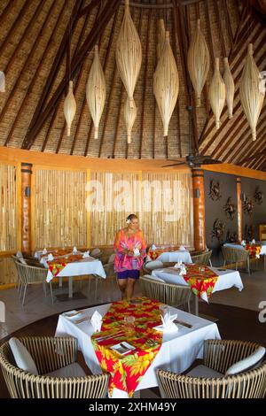 French Polynesia, Bora Bora island, waiter under the Poerava pavilion ...