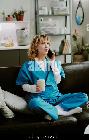 Nurse in pink uniform Stock Photo - Alamy
