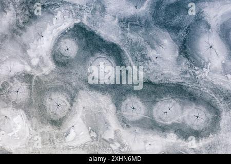 Aerial view of ice formations, structures, frozen lake, Lake Riegsee ...